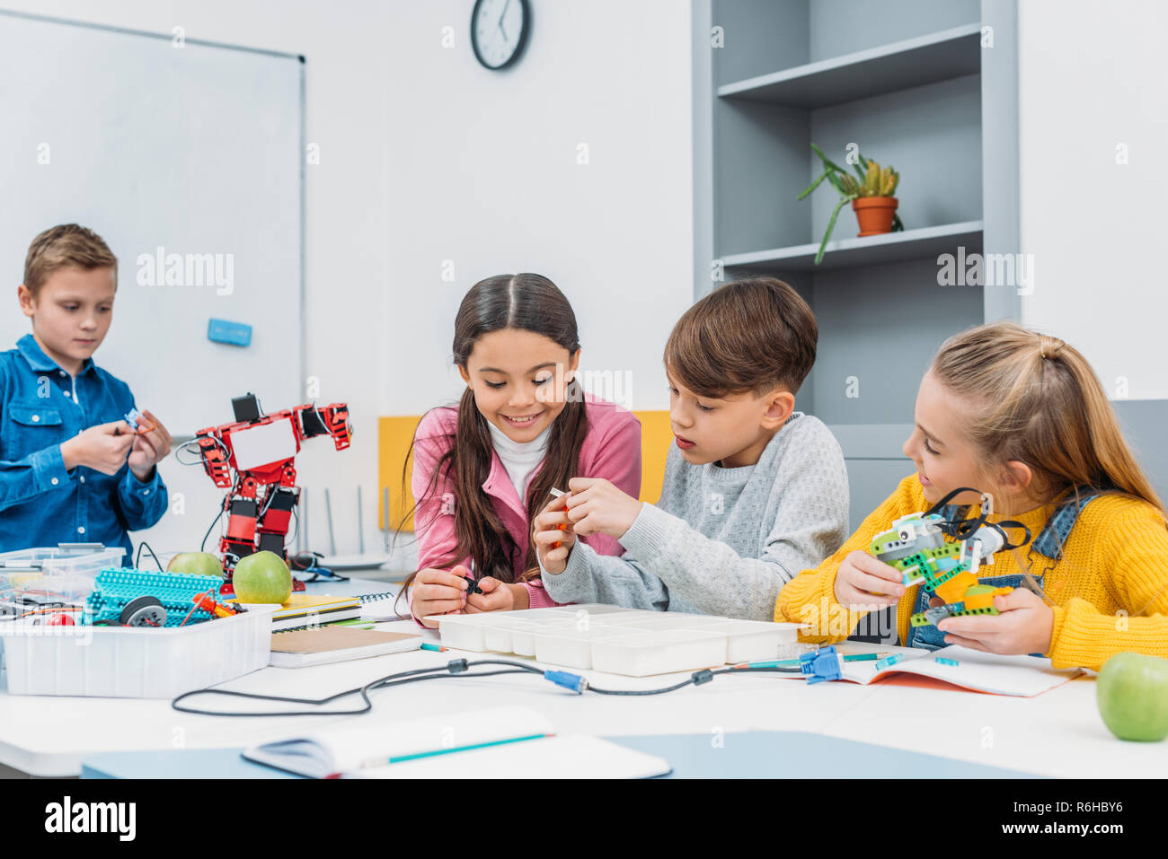 children working together on STEM project in classrom Stock Photo - Alamy