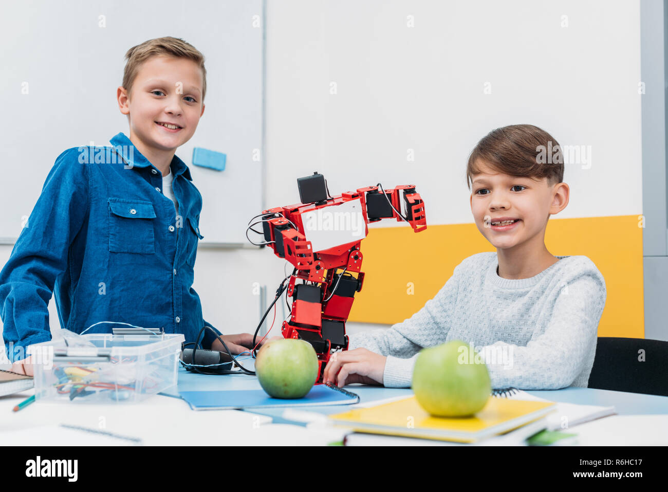 schoolboys working with robot at STEM robotics lesson Stock Photo - Alamy