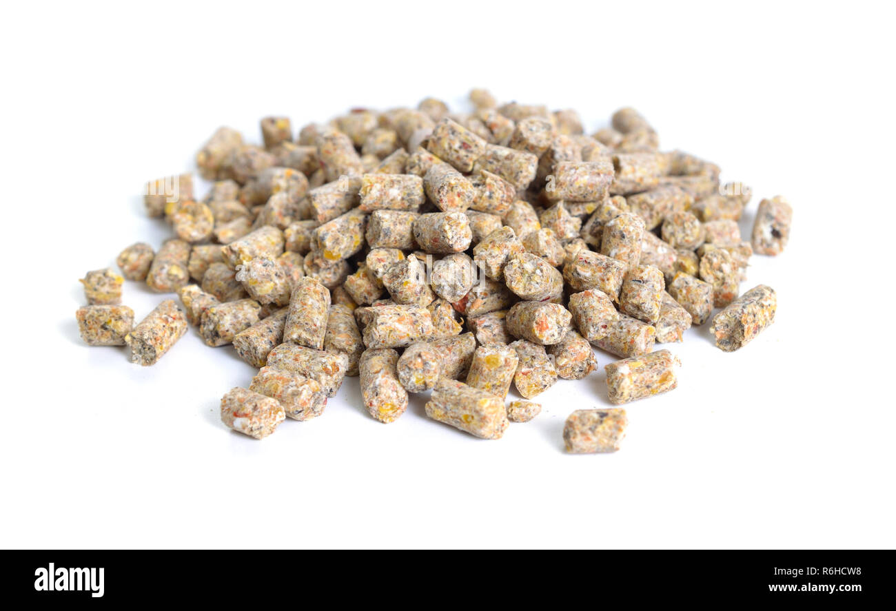 A pelleted ration designed for chicken. Isolated on white background ...