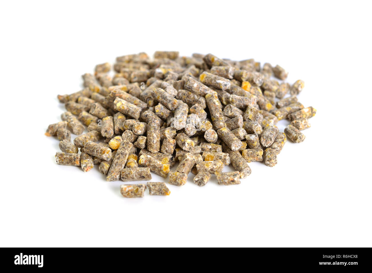A pelleted ration designed for chicken. Isolated on white background ...