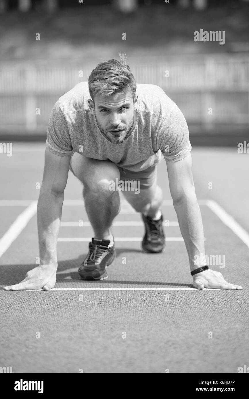 Man running starting position Black and White Stock Photos & Images - Alamy