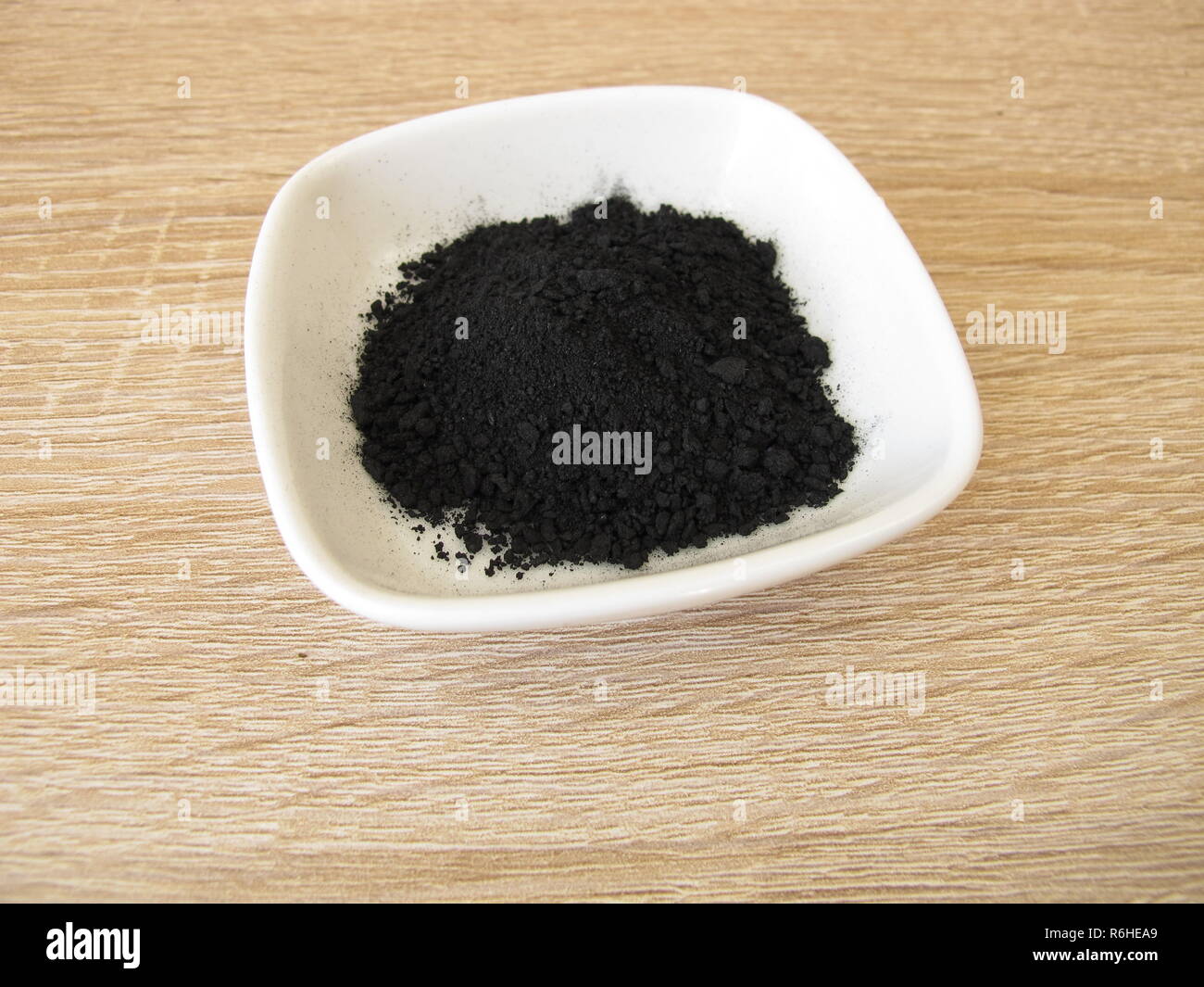 ground medical activated carbon powder Stock Photo - Alamy