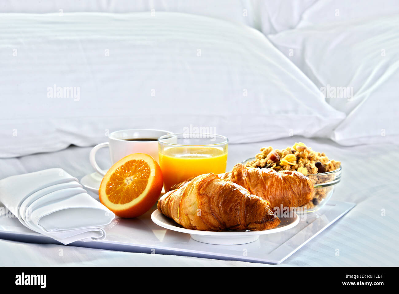 Breakfast in bed in hotel room Stock Photo - Alamy