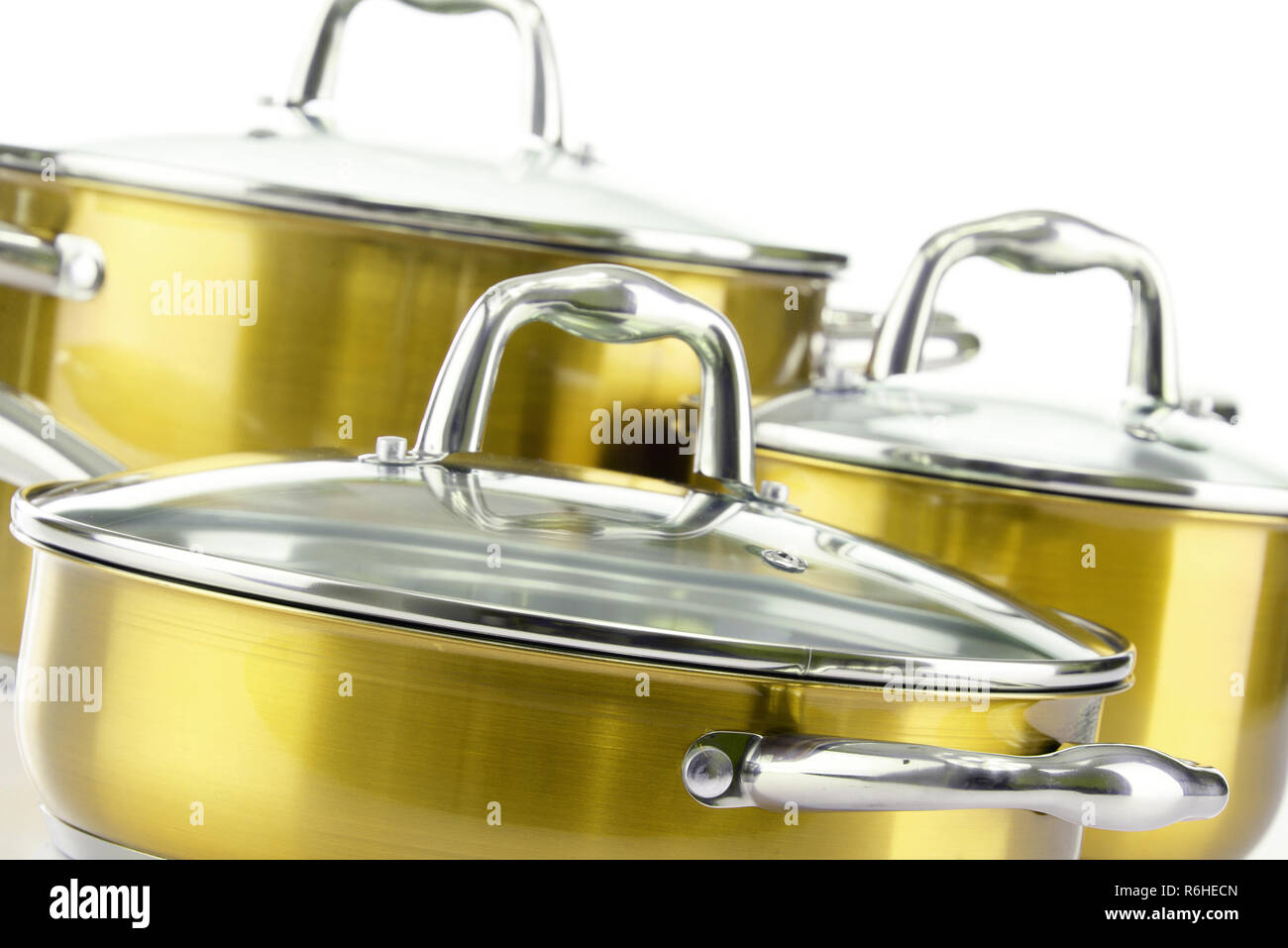 Composition with three steel pots Stock Photo - Alamy