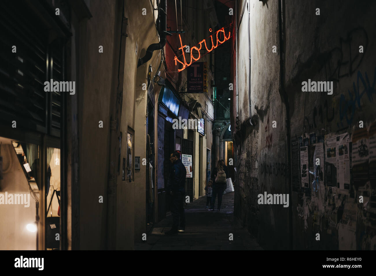 Genoa, Italy - October 30, 2016: People walking past the shops on a ...