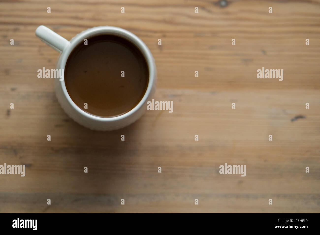 small white cup of coffee Stock Photo - Alamy
