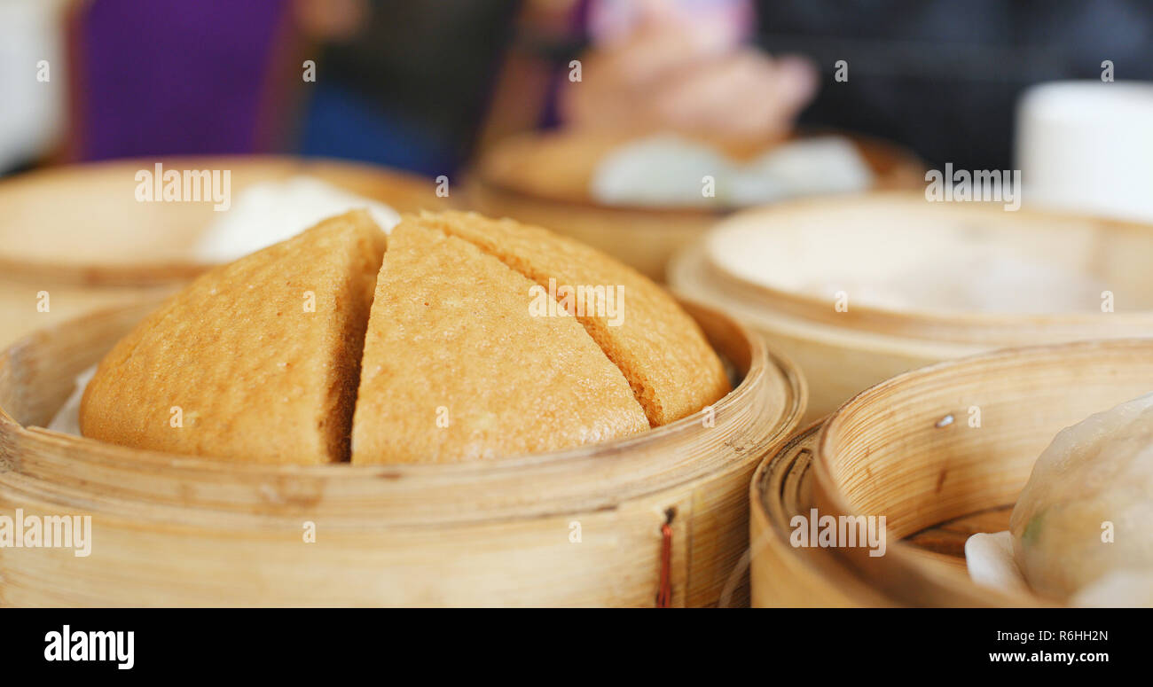 Eating steamed chinese dim sum in restaurant Stock Photo - Alamy