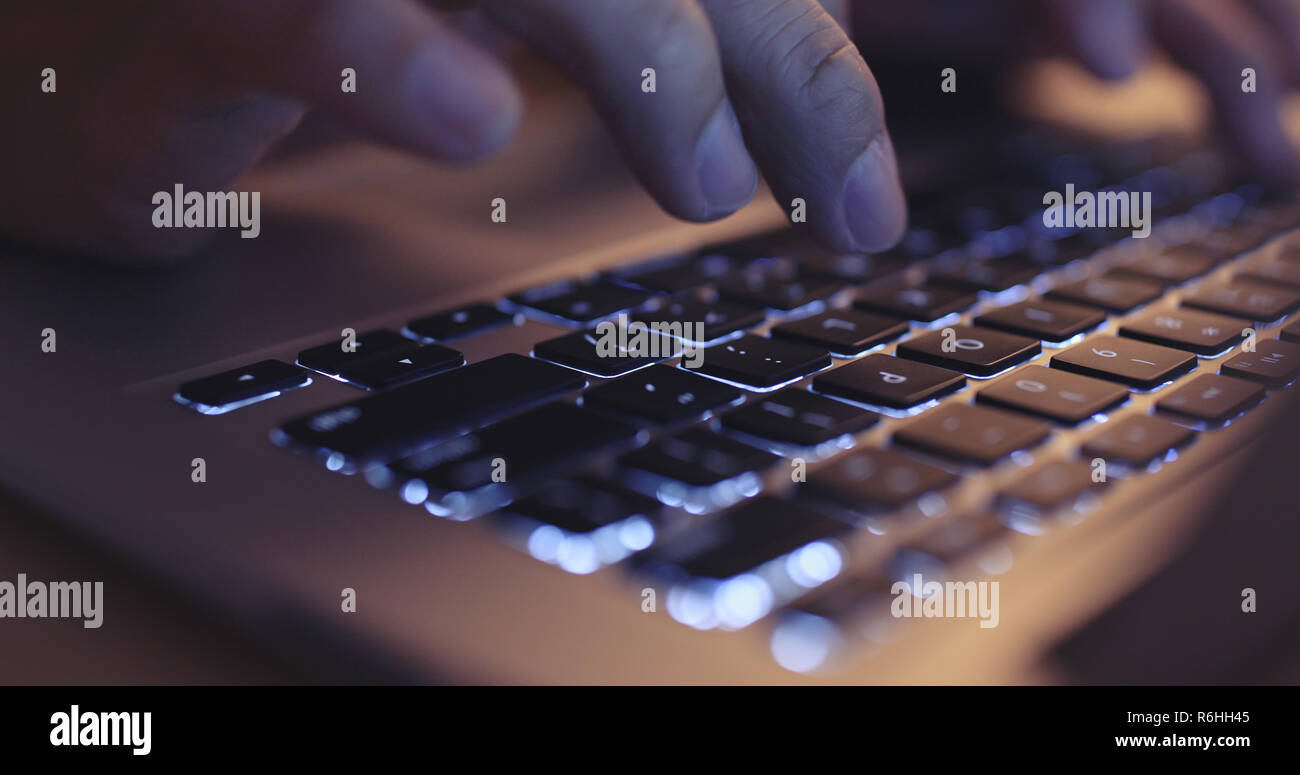 Fingers typing on keyboard Stock Photo - Alamy