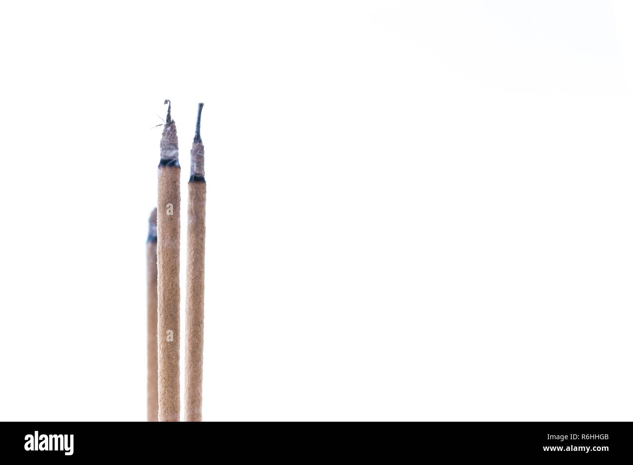 Burning incense isolated on white background Stock Photo - Alamy