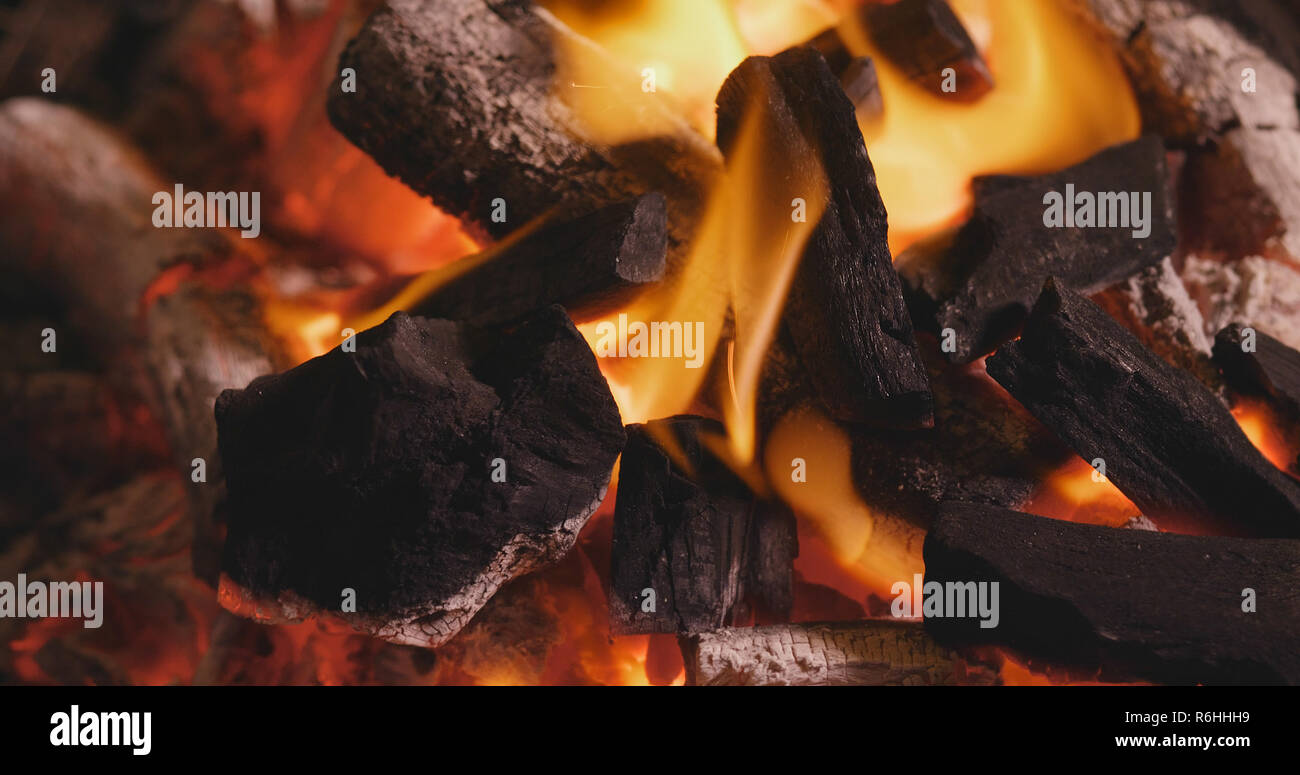 Burning fire and bright coal Stock Photo - Alamy