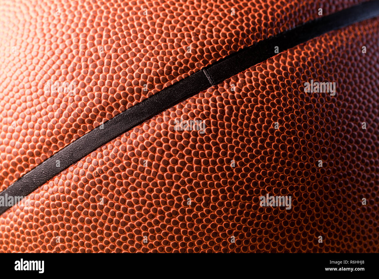 Basketball skin texture in orange Stock Photo - Alamy