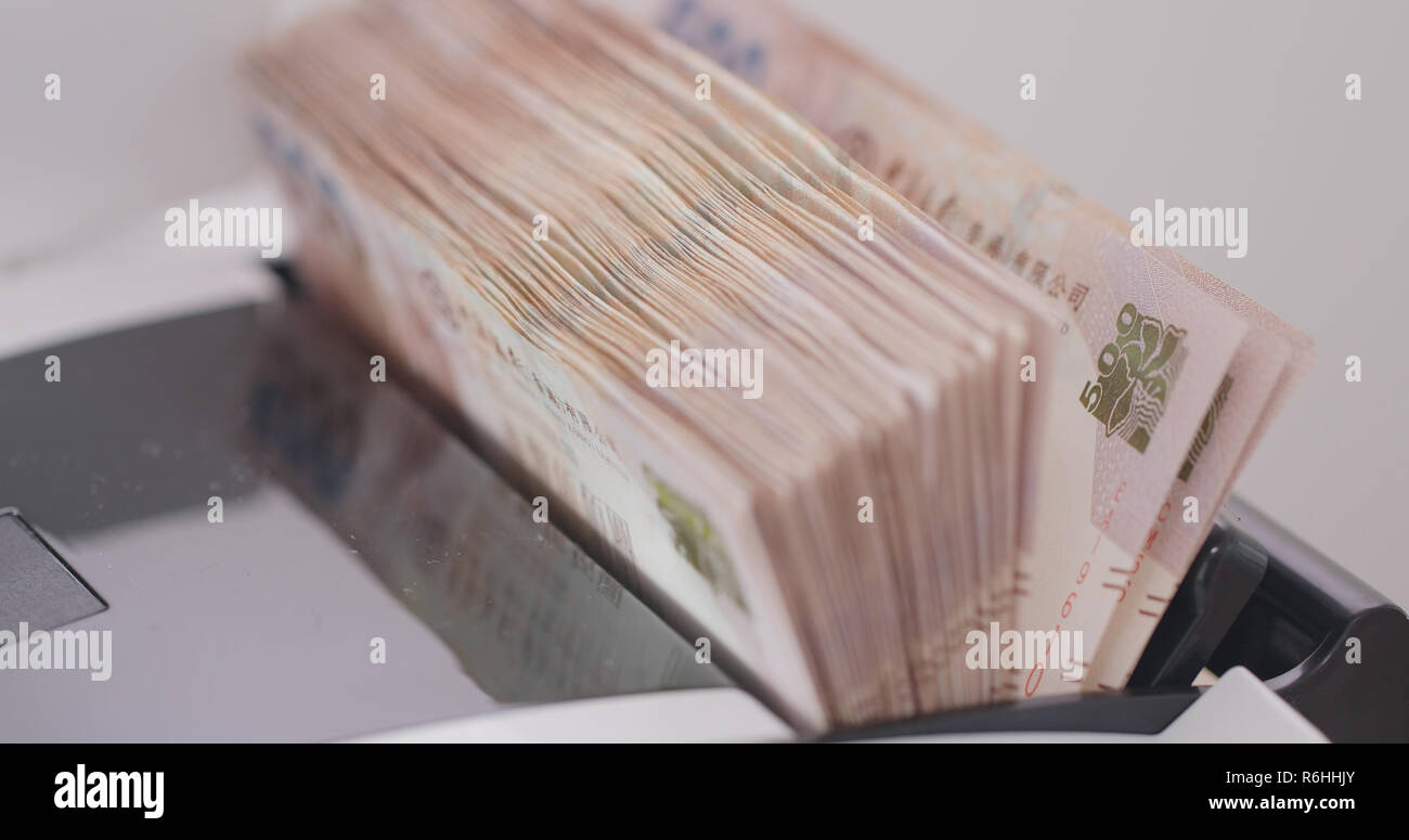 Cash money counting for Hong Kong bank note Stock Photo - Alamy