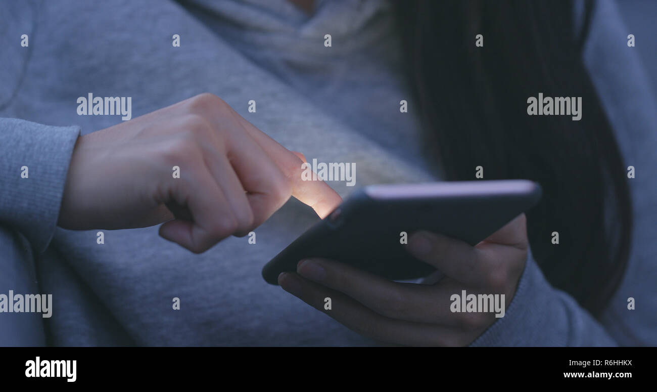 Using mobile phone at night Stock Photo - Alamy