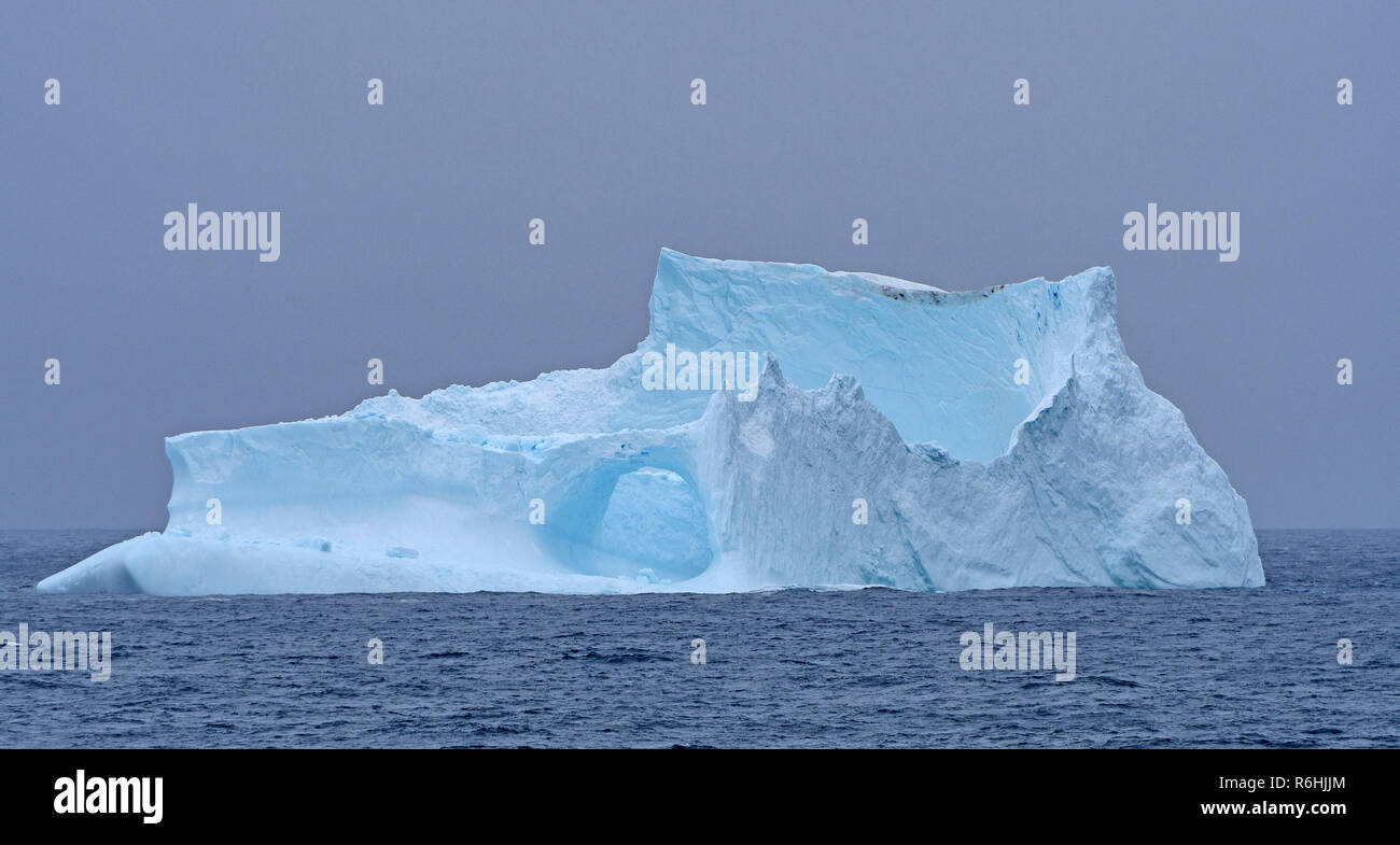 Iceberg Coming out of the Fog Stock Photo - Alamy
