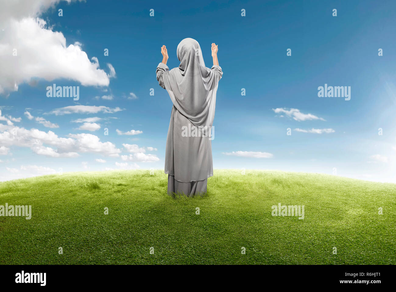 Back view of asian muslim girl praying to god Stock Photo - Alamy
