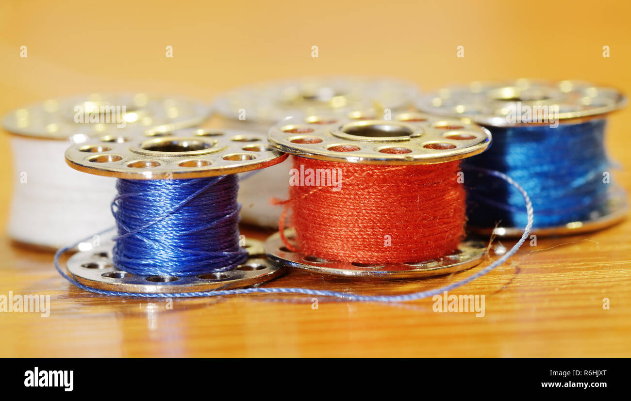 Coil with a sewing thread.Use for sewing clothes Stock Photo - Alamy