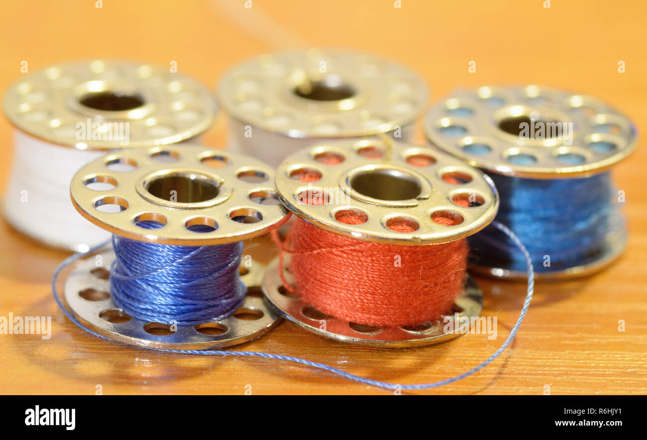 Coil with a sewing thread.Use for sewing clothes Stock Photo - Alamy