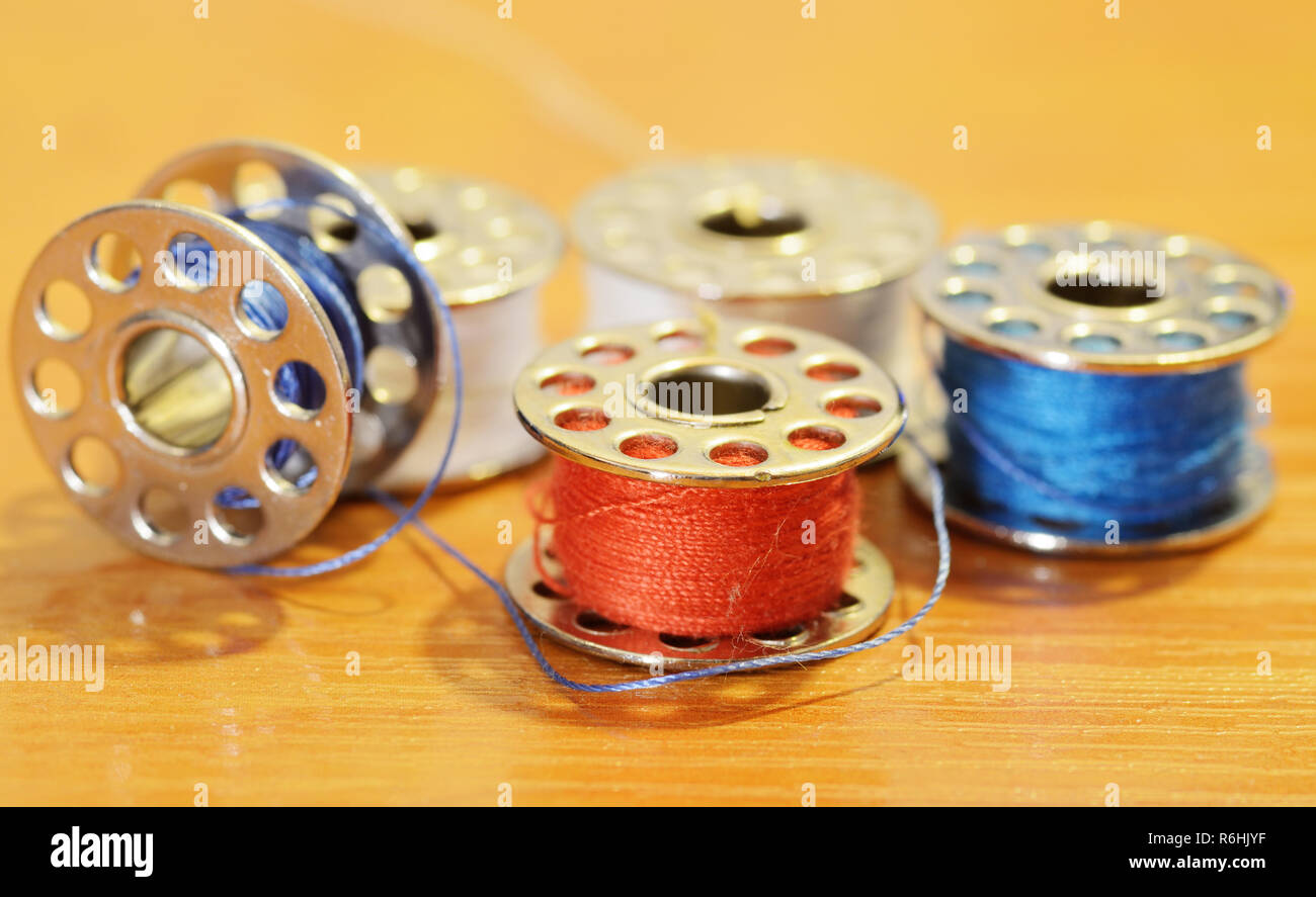 Coil with a sewing thread.Use for sewing clothes Stock Photo - Alamy