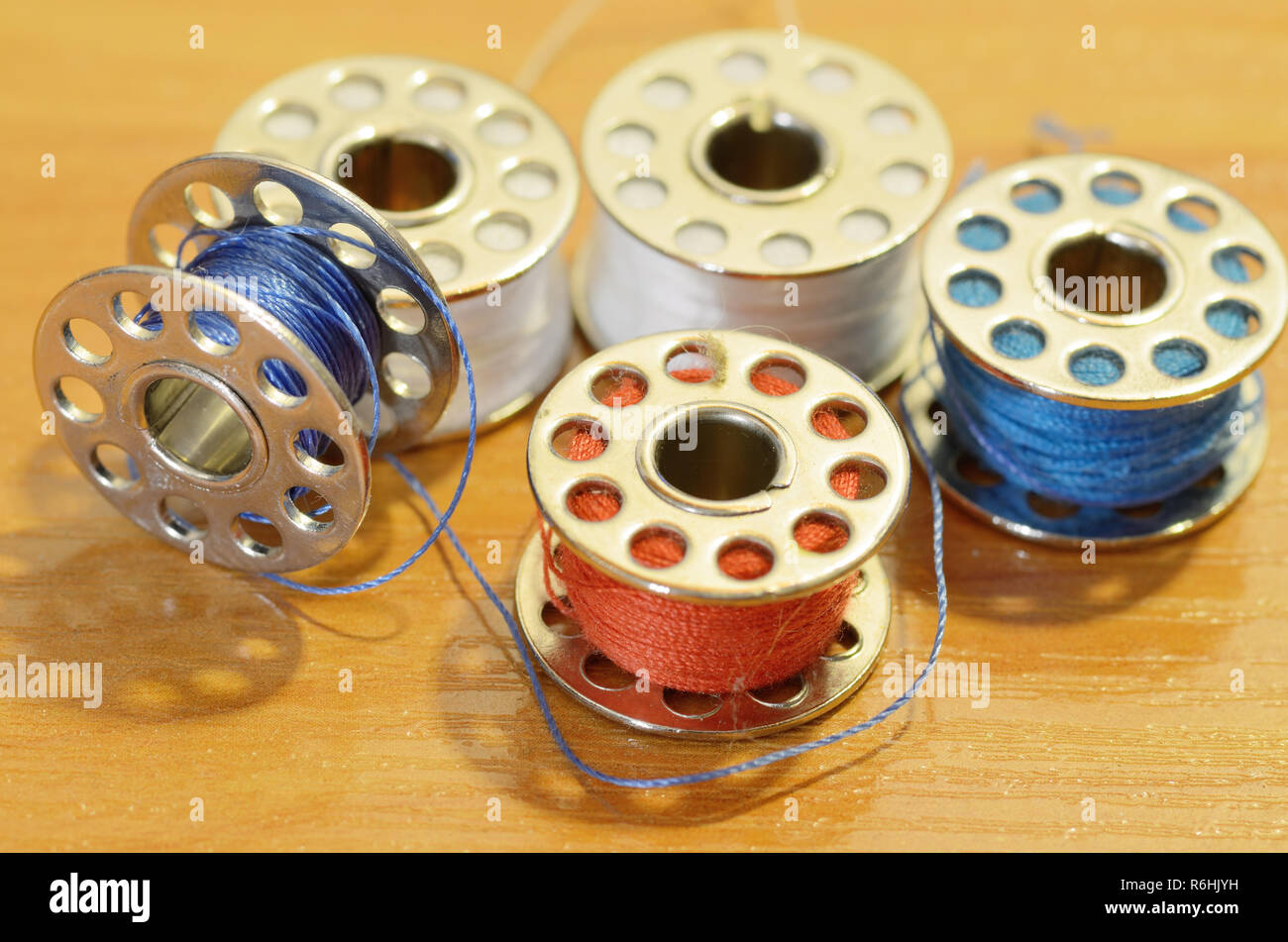 Coil with a sewing thread.Use for sewing clothes Stock Photo - Alamy