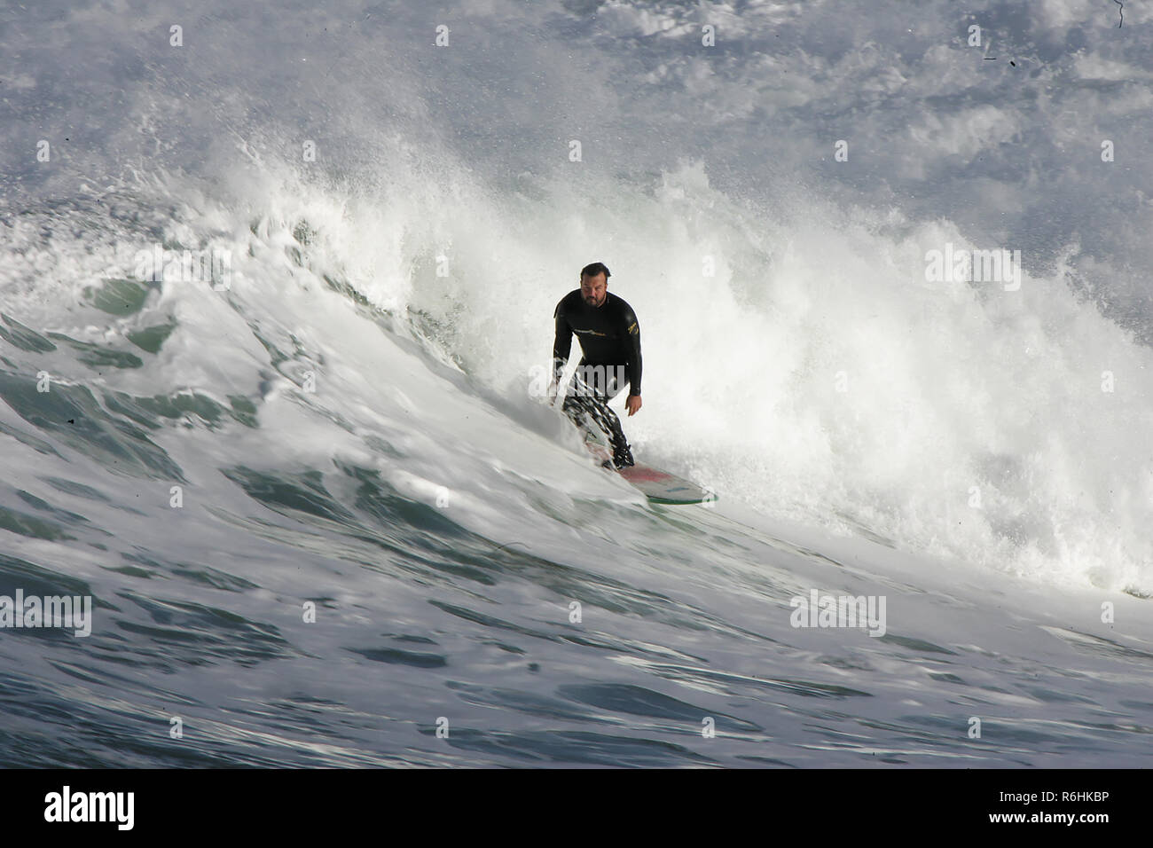 Big wave surfing at Newquay`s Cribbar point at Fistral Bay, Cornwall ...