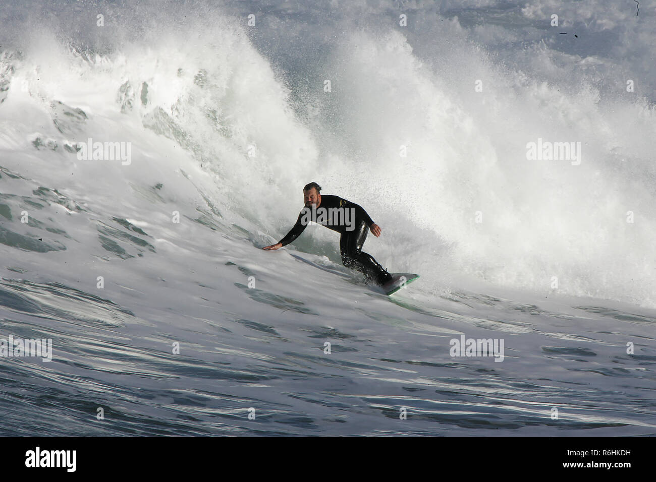 Big wave surfing at Newquay`s Cribbar point at Fistral Bay, Cornwall ...