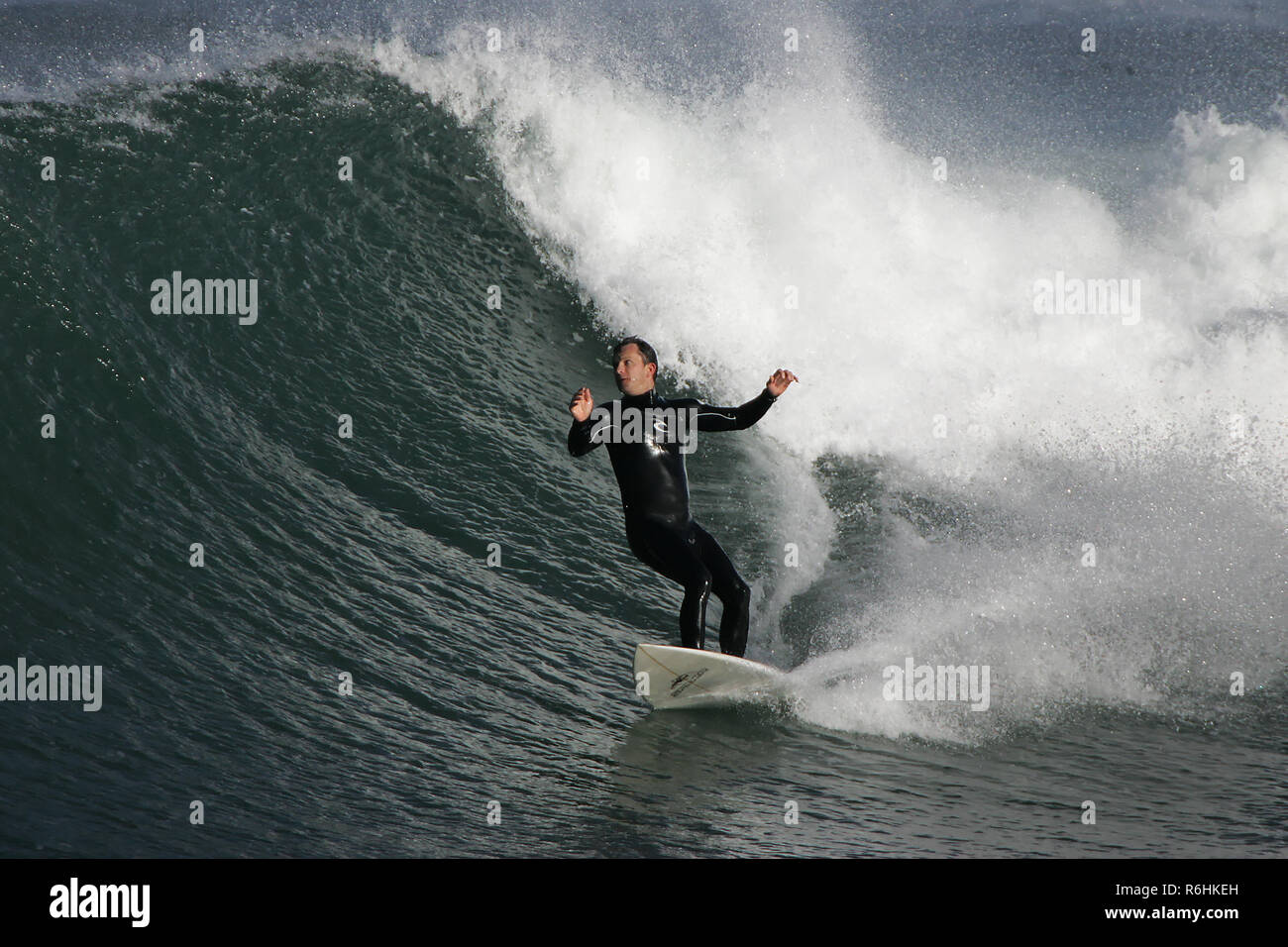 Big wave surfing at Newquay`s Cribbar point at Fistral Bay, Cornwall ...