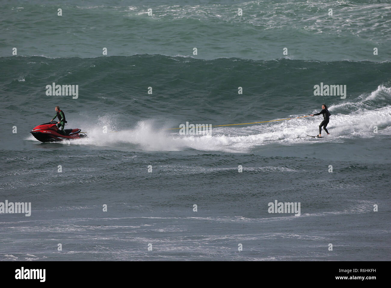 Big wave surfing at Newquay`s Cribbar point at Fistral Bay, Cornwall ...