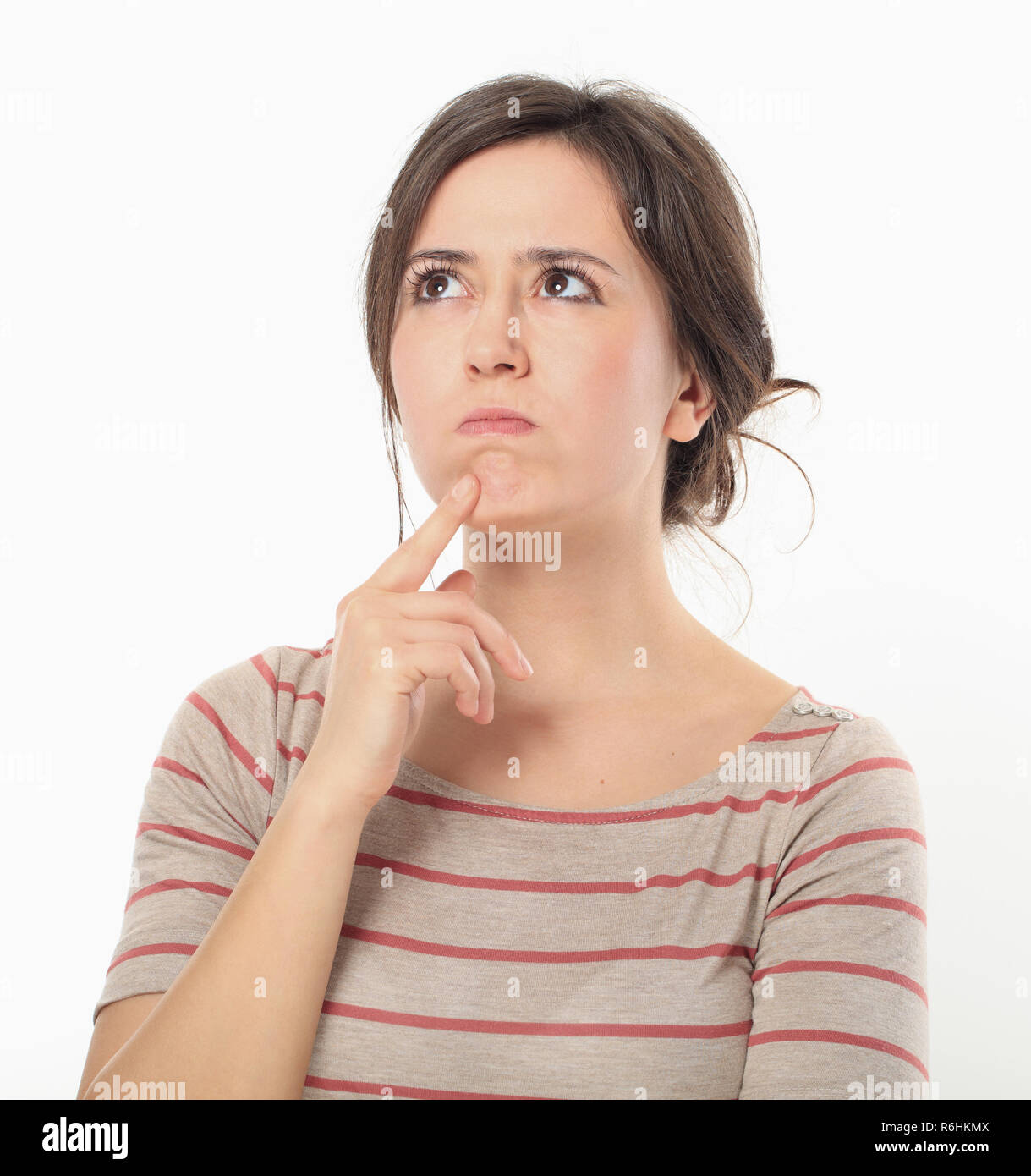 Nice woman looking upwards and holding her bread Stock Photo - Alamy