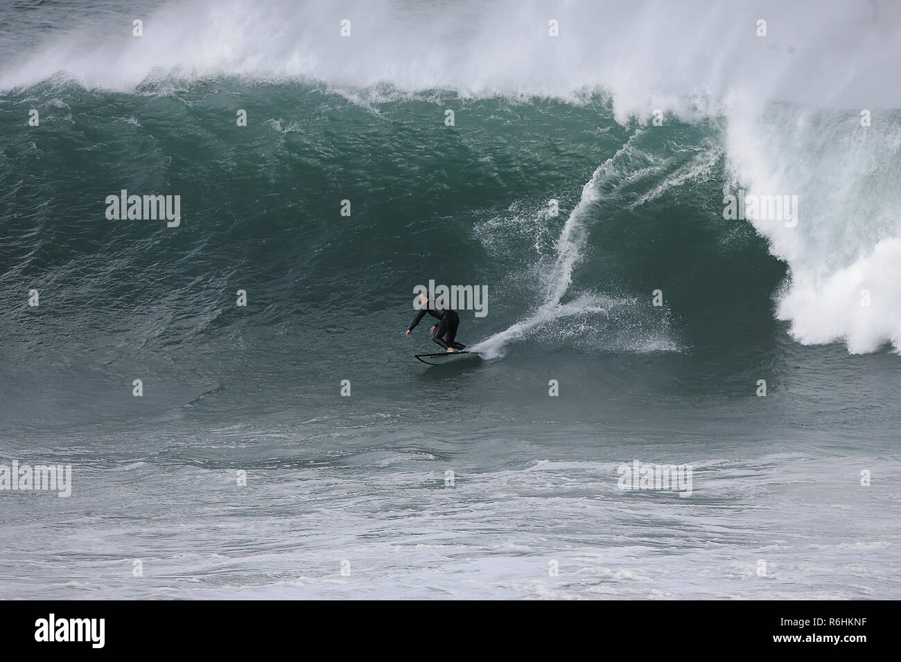 Big wave surfing at Newquay`s Cribbar point at Fistral Bay, Cornwall ...