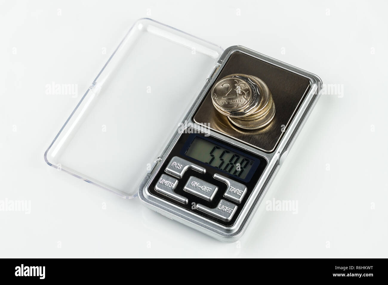 Digital scale coins hi-res stock photography and images - Alamy