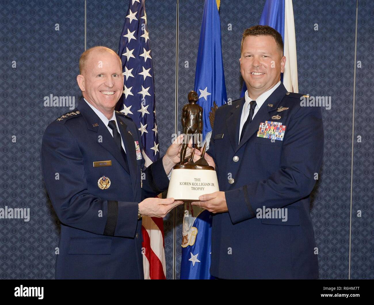 Air Force Vice Chief of Staff Gen. Stephen Wilson presents the Koren ...