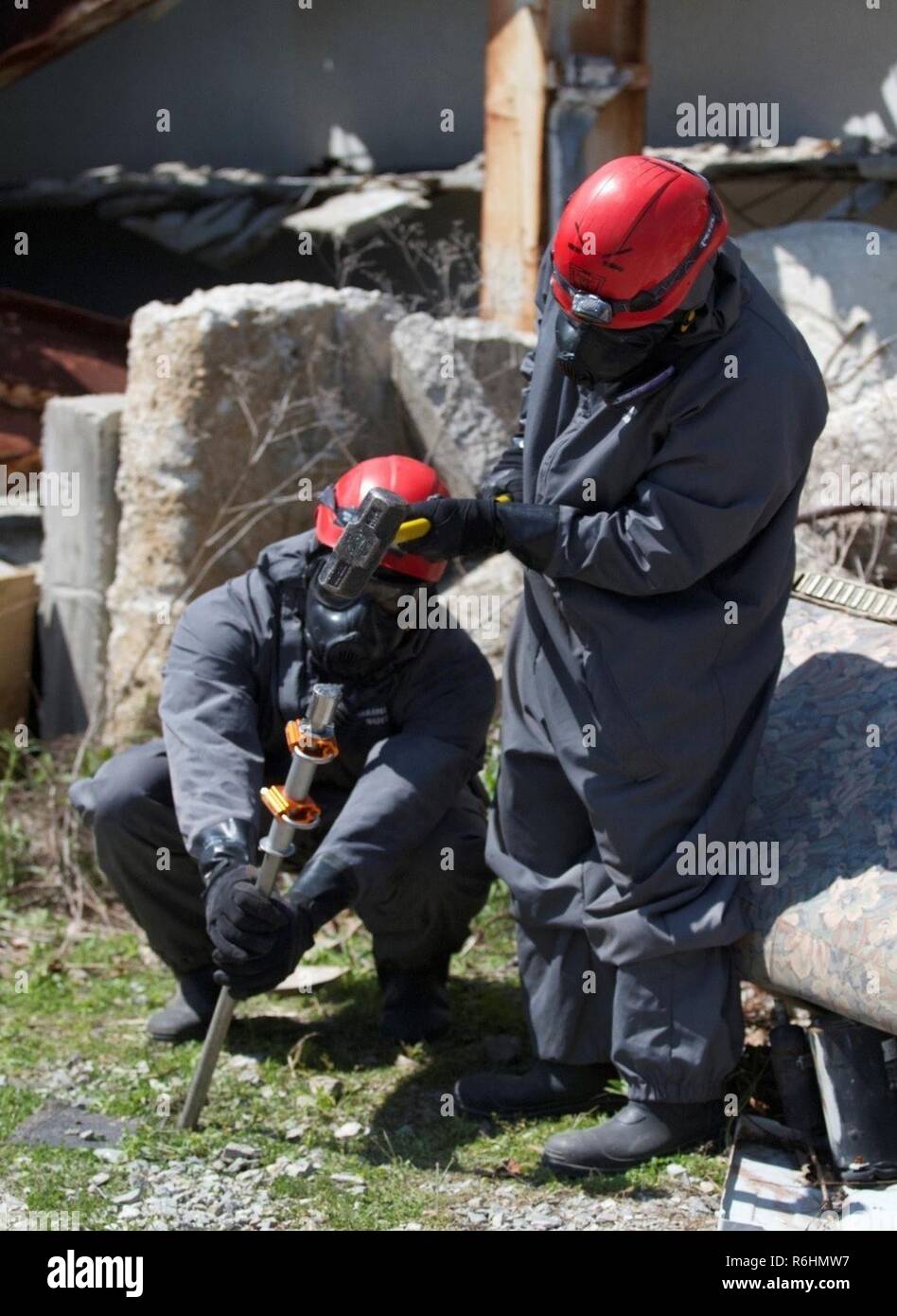 Soldiers, equipped with chemical, biological, radioactive, and nuclear ...