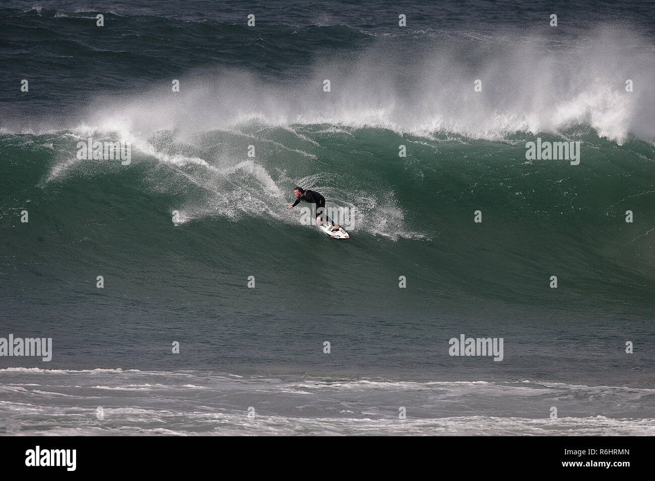 Big wave surfing at Newquay`s Cribbar point at Fistral Bay, Cornwall ...