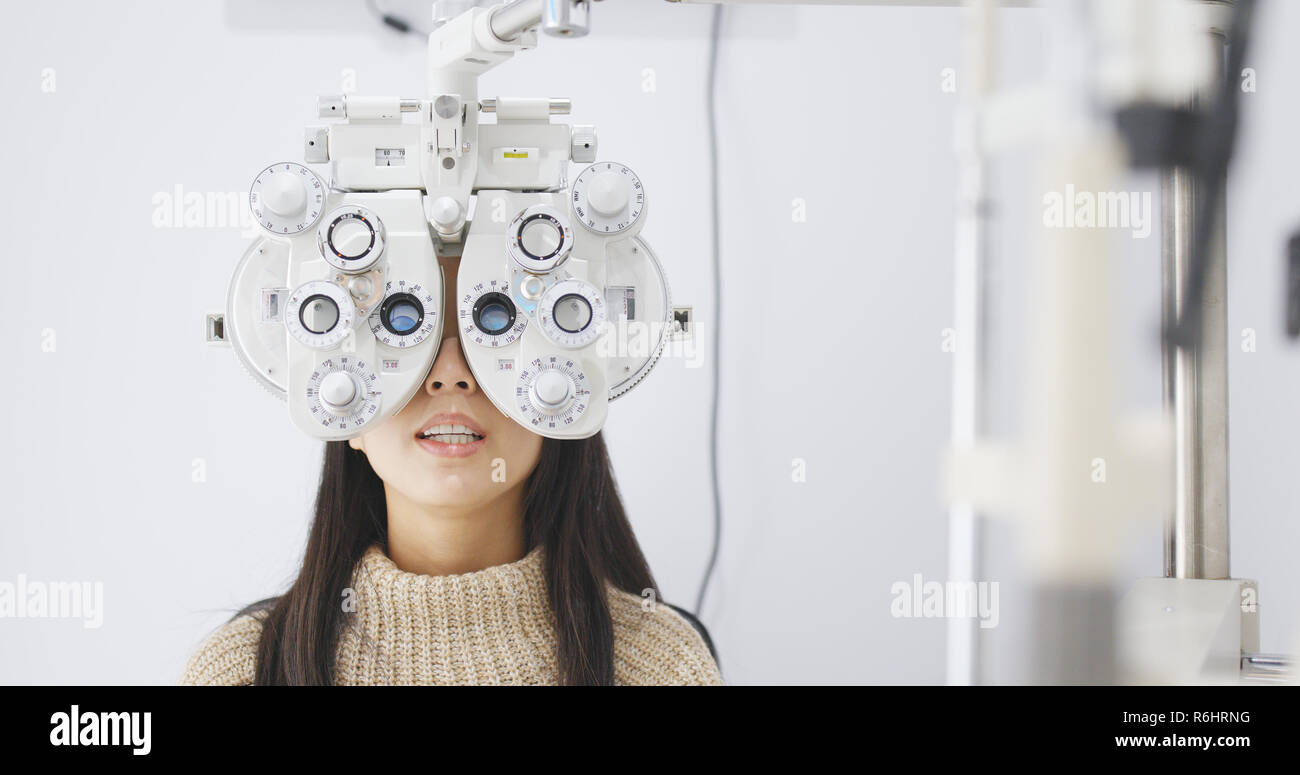 Female ophthalmologist doctor doing visual hi-res stock photography and ...