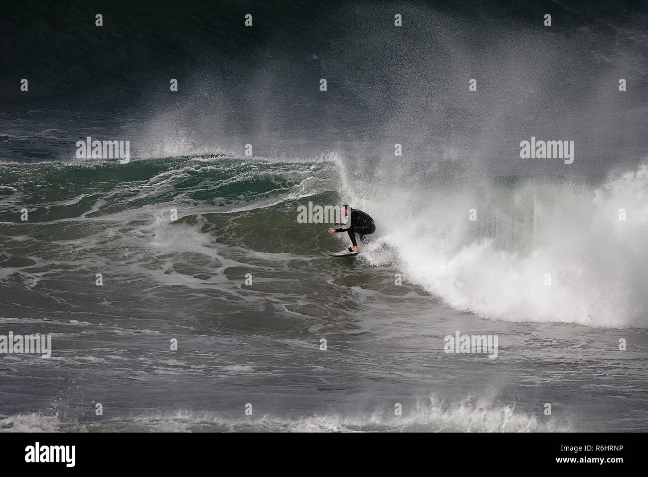 Big wave surfing at Newquay`s Cribbar point at Fistral Bay, Cornwall ...