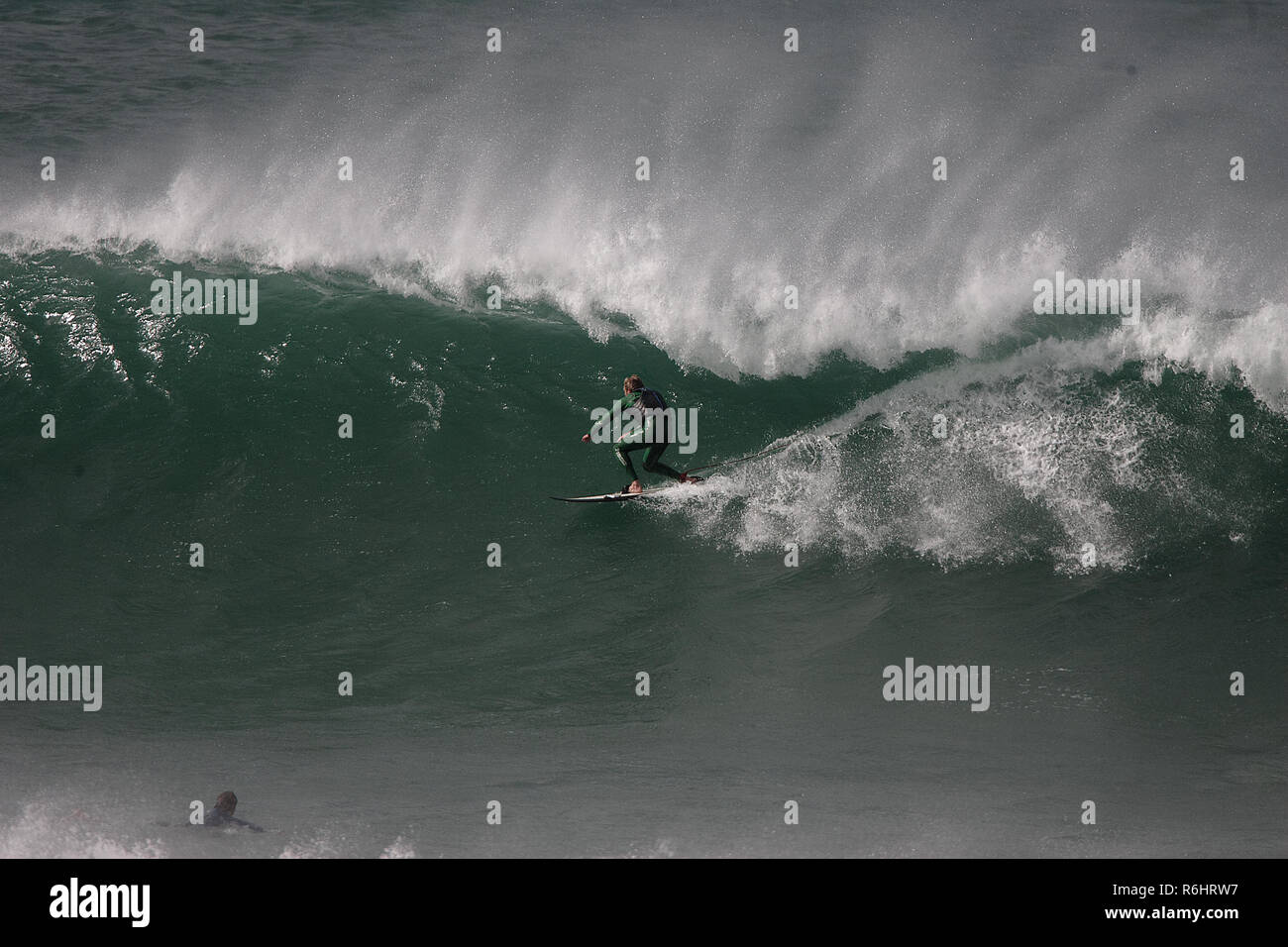 Big wave surfing at Newquay`s Cribbar point at Fistral Bay, Cornwall ...
