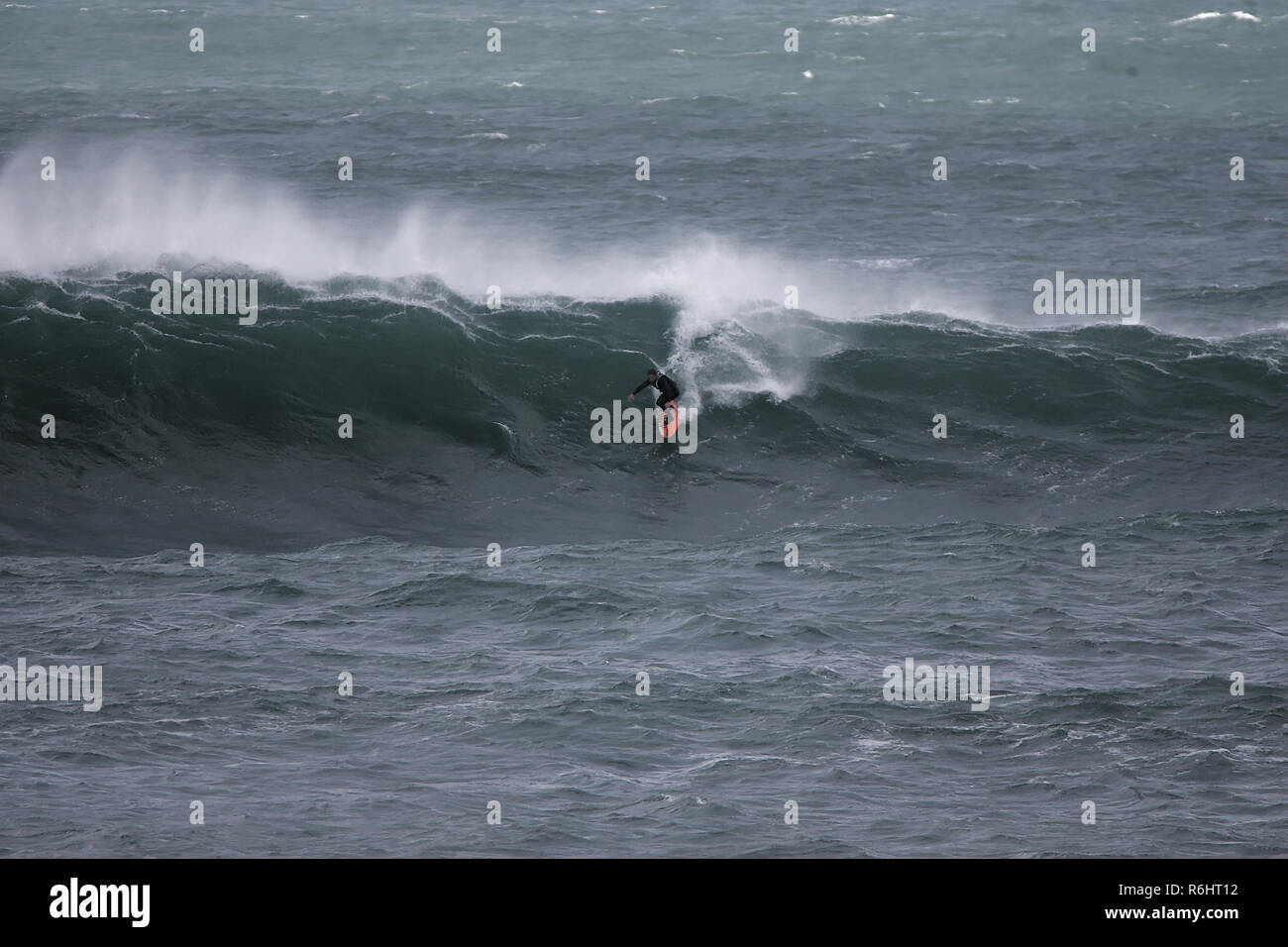 Big wave surfing at Newquay`s Cribbar point at Fistral Bay, Cornwall ...