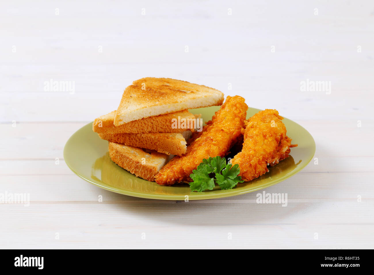 chicken strips with toast Stock Photo - Alamy