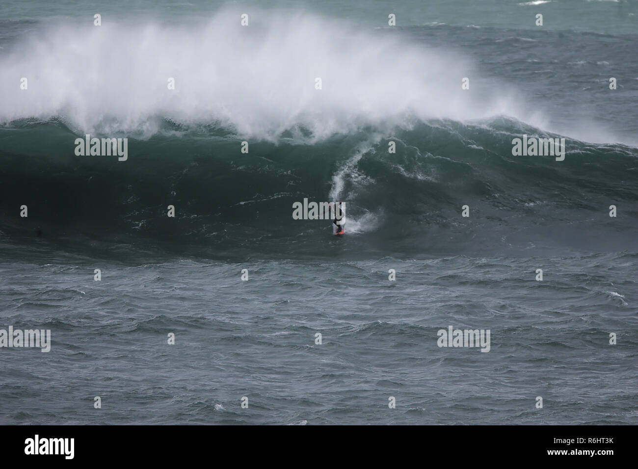 Big wave surfing at Newquay`s Cribbar point at Fistral Bay, Cornwall ...
