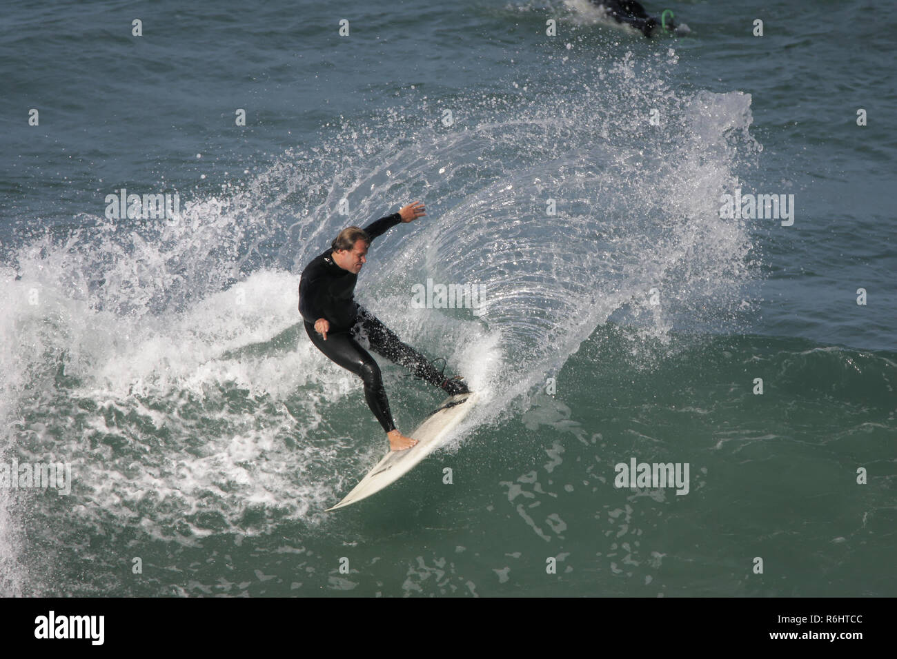 Big wave surfing at Newquay`s Cribbar point at Fistral Bay, Cornwall ...