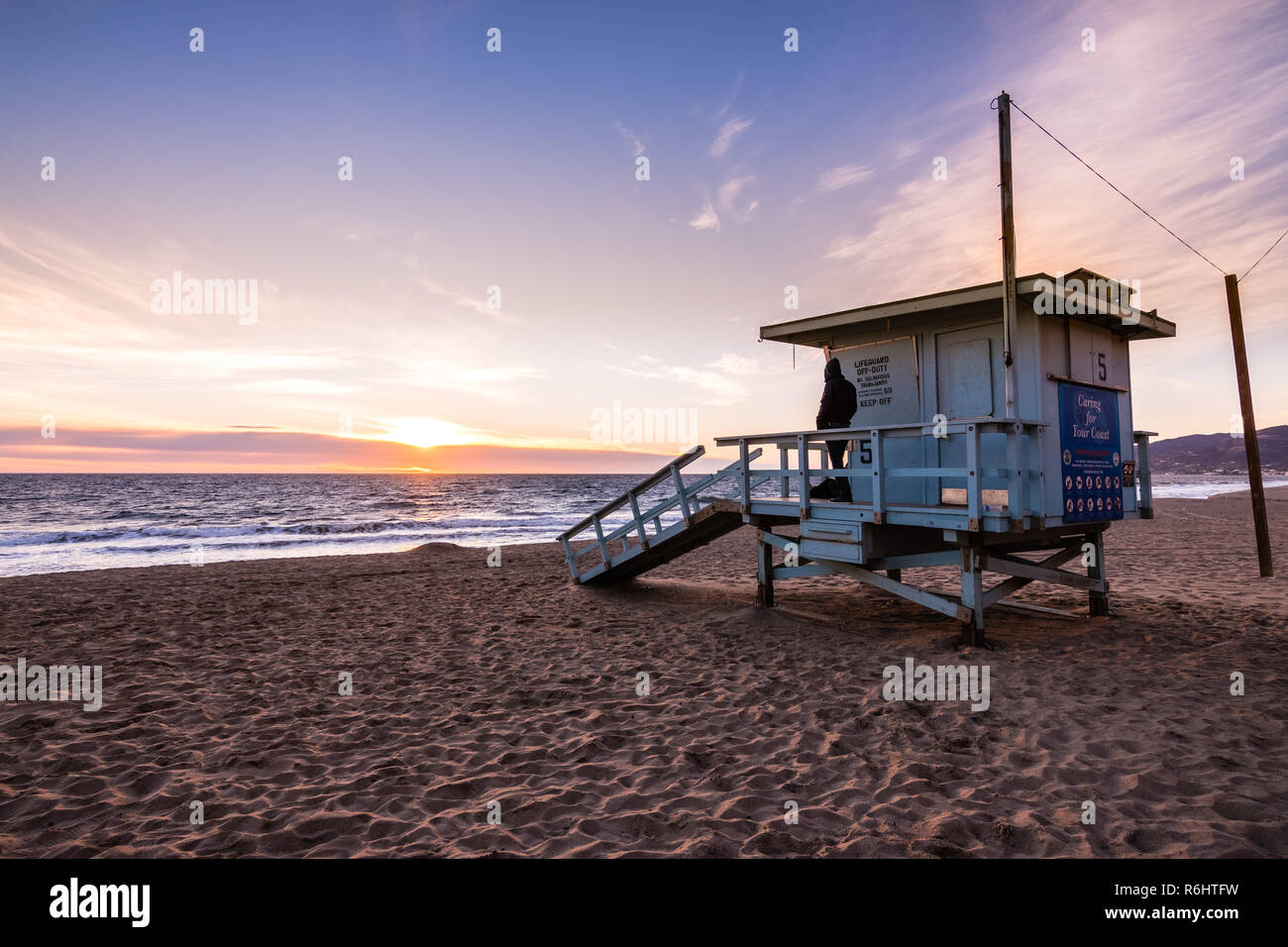 Lifeguard tower on one of the sandy Malibu beaches; beautiful sunset ...