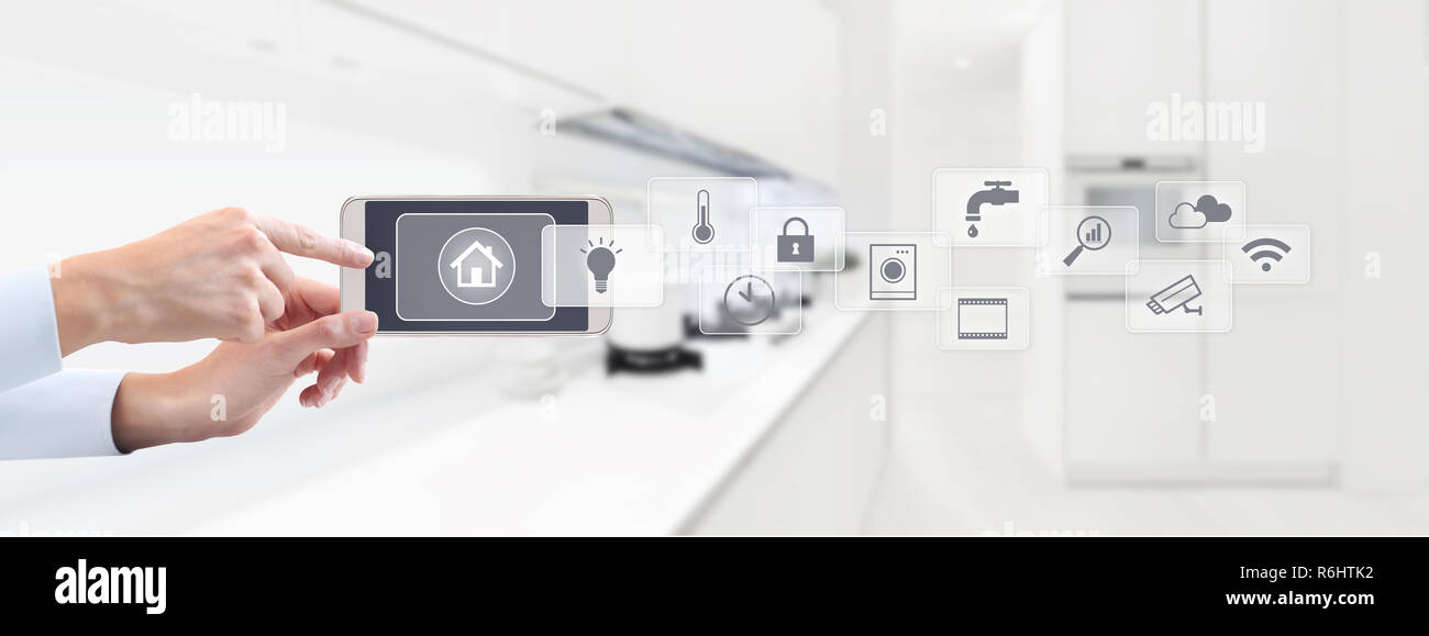 smart home automation control concept hand touch cell phone screen with ...