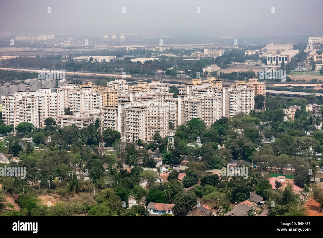 side top view of urban city building & greenery looking awesome from a ...