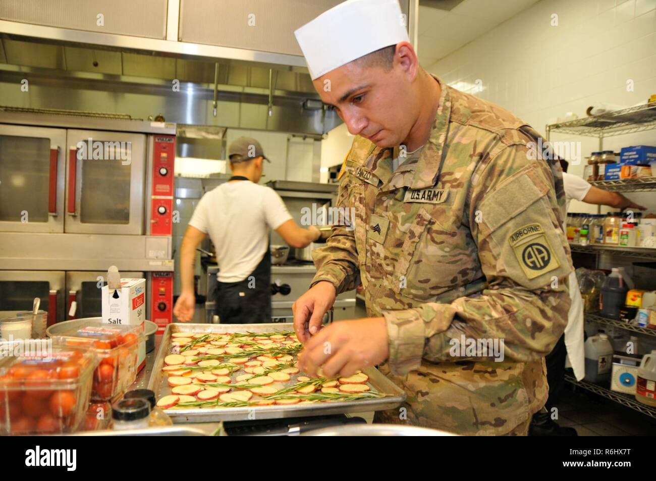 Sergeant Marco Manzo, a food service specialist from Headquarters ...