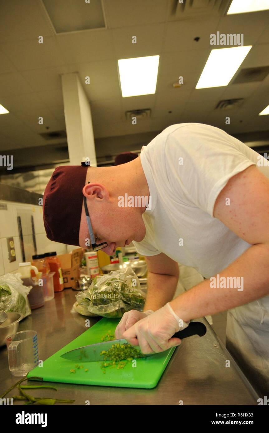 Private 1st Class Ethan Camp, a food service specialist with the Troop ...
