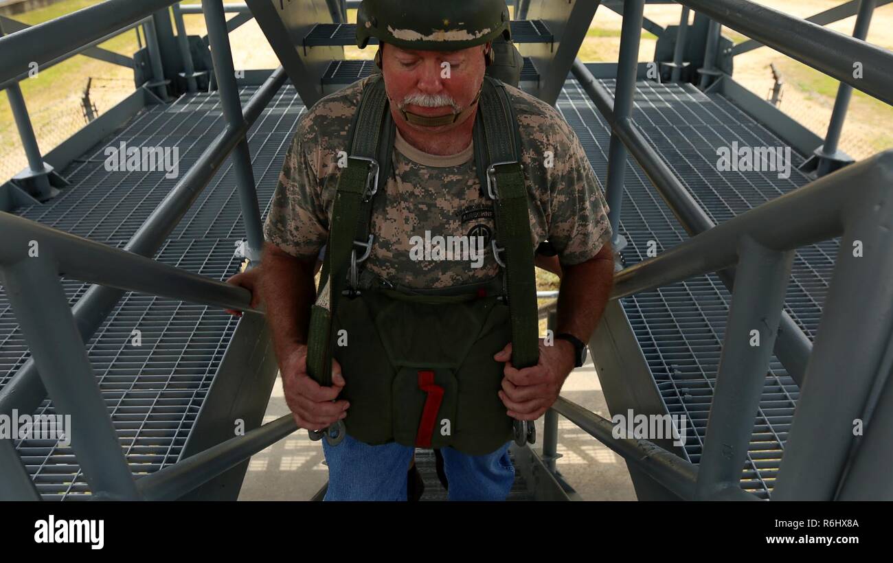 A retired Paratrooper climbs the stairs of the 34-foot tower at the U.S ...