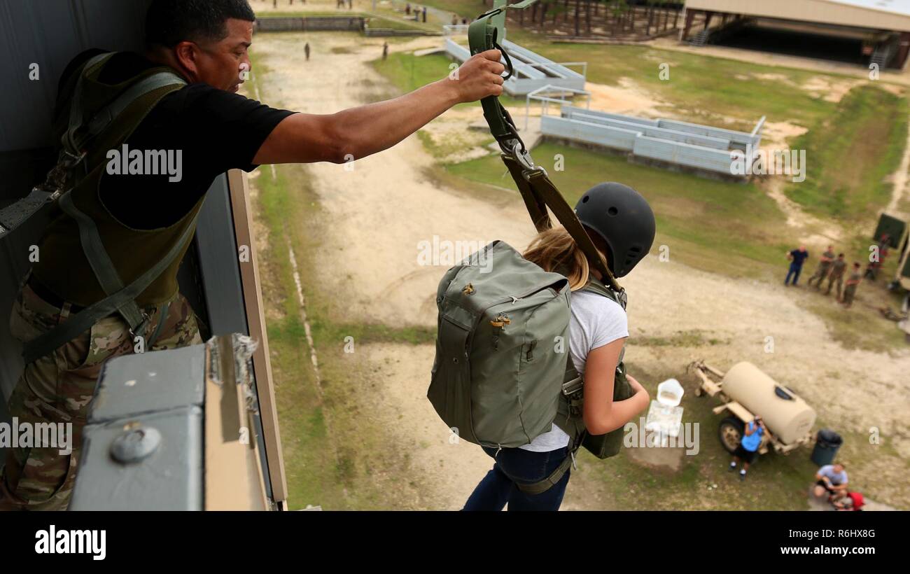 A young family member exits the 34-foot tower at the U.S. Army Advanced ...