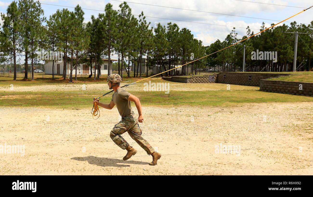 A Paratrooper runs a cable back to the U.S. Army Advanced Airborne ...