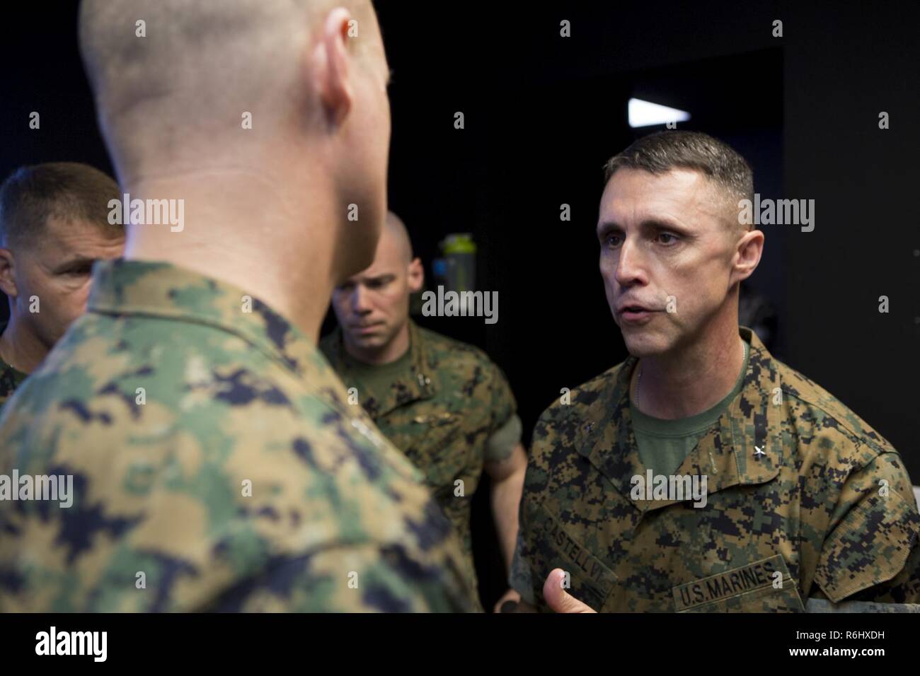 Brig. Gen. Robert F. Castellvi speaks to Col. John Rahe about ship ...
