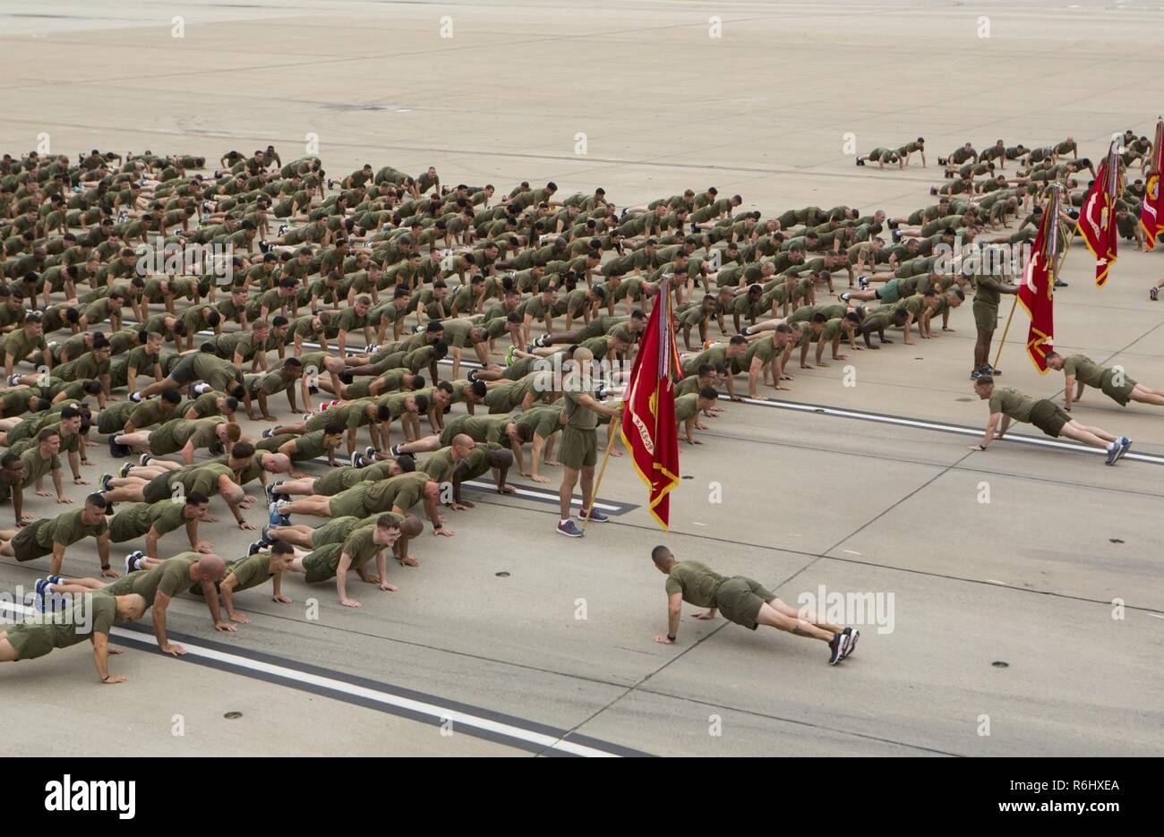 Marines with Marine Aircraft Group (MAG) 39 do push-ups after the MAG ...